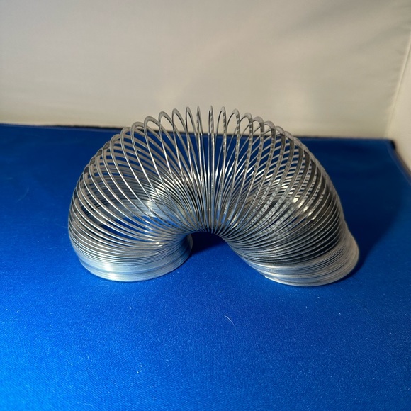 Slinky Brand | Games | Slinky Original Walking Spring Toy | Poshmark